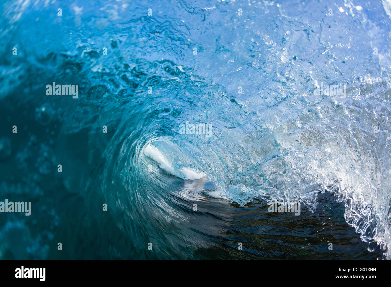 Ocean blue wave crashing swimming inside closeup encounter of water ...