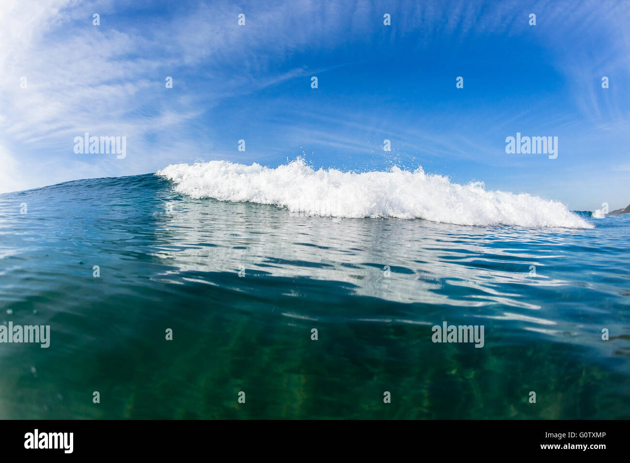 Ocean blue wave crashing white water swimming inside closeup encounter ...