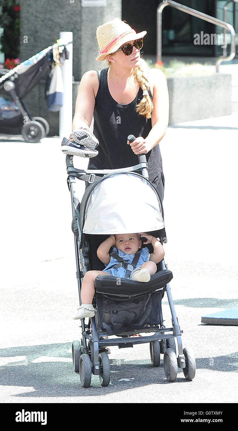 Donald Faison and Cacee Cobb take their two kids to the farmers market ...