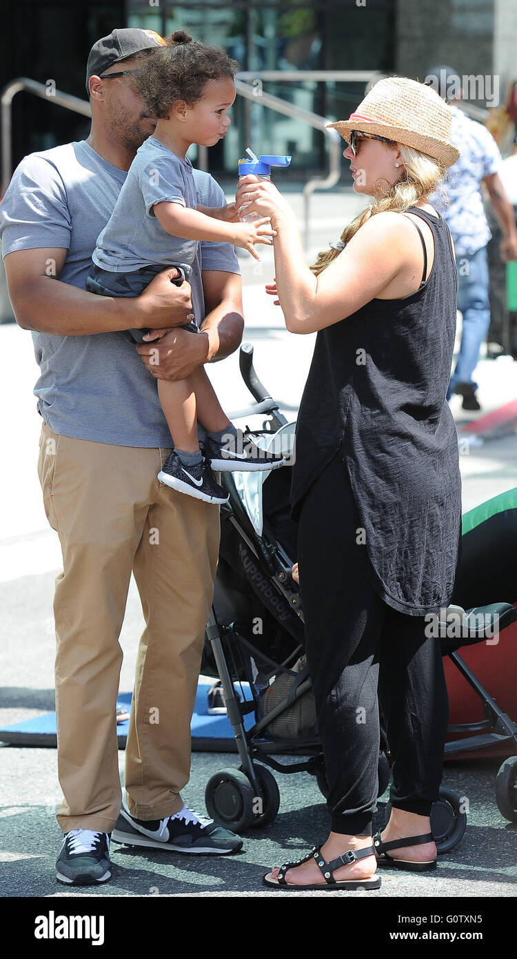 Donald Faison and Cacee Cobb take their two kids to the farmers market ...