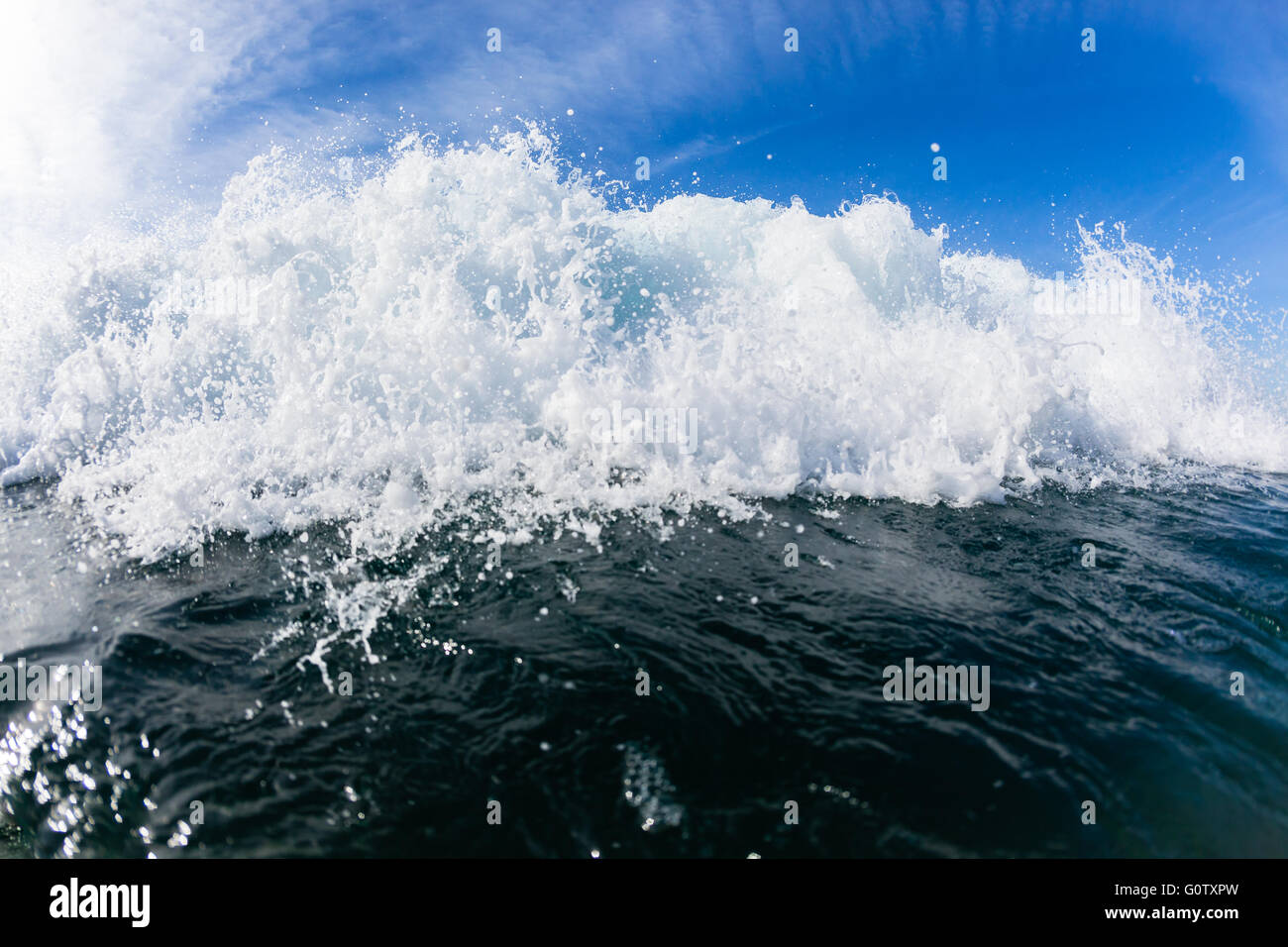Ocean blue wave crashing white water swimming inside closeup encounter ...