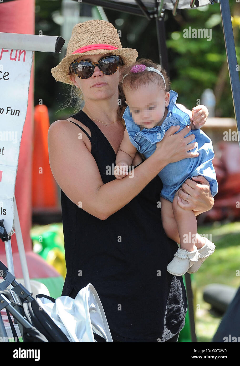 Donald Faison and Cacee Cobb take their two kids to the farmers market ...