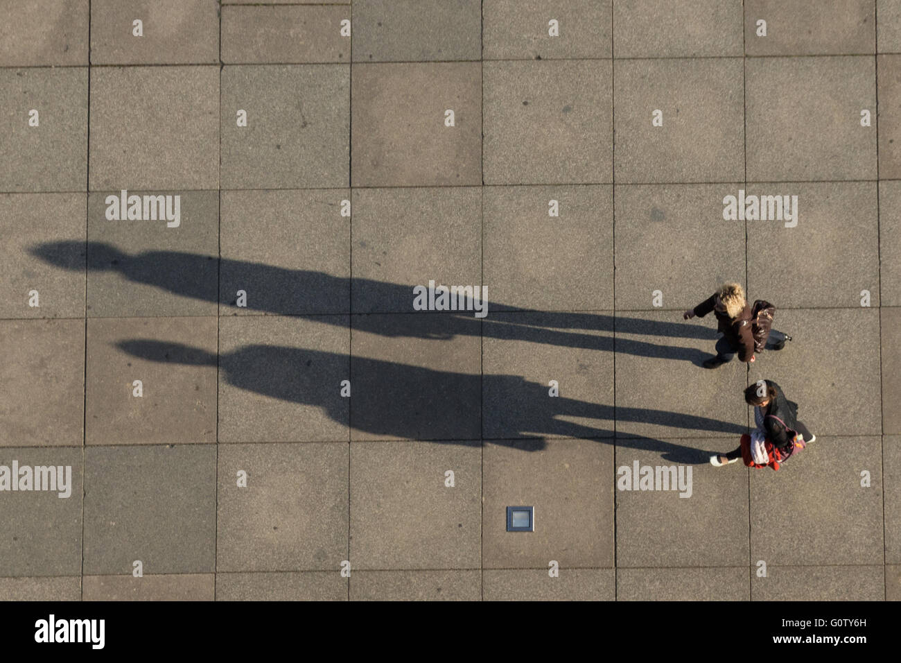 Long shadows of two people from above - aerial Stock Photo - Alamy