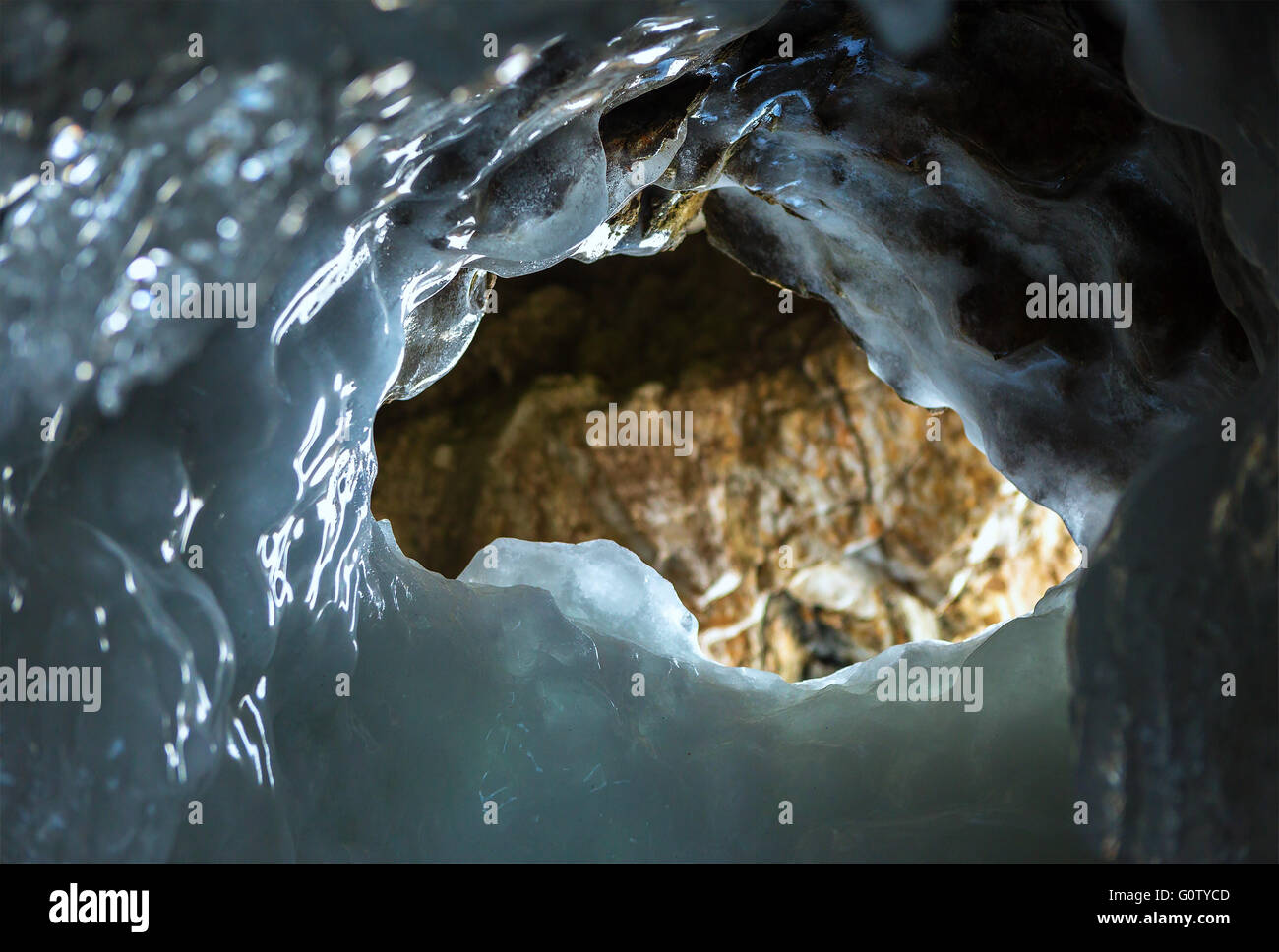 Ice Hole in the grotto Stock Photo - Alamy