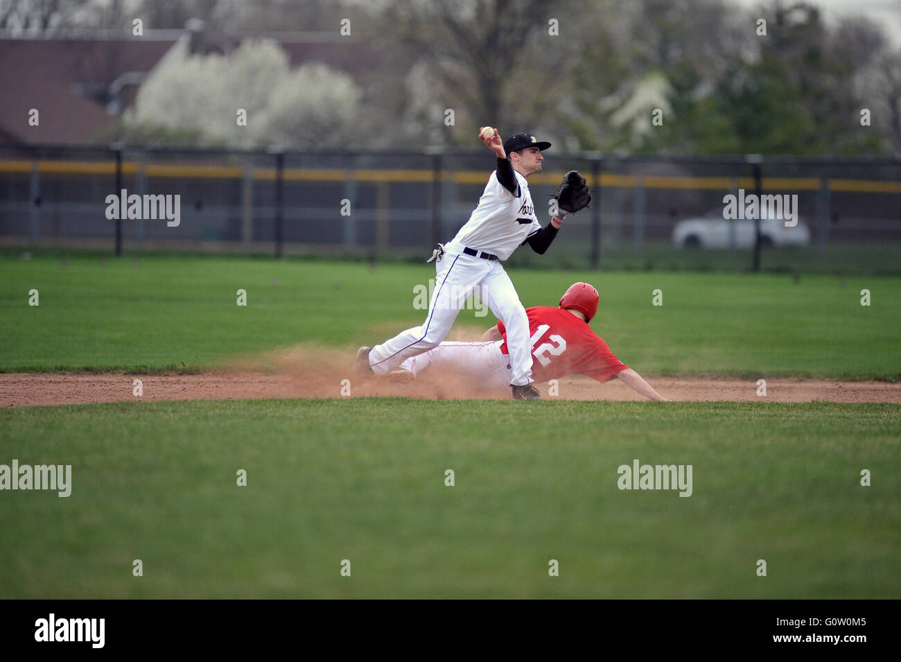 Baseball sliding of youth players hi-res stock photography and images ...