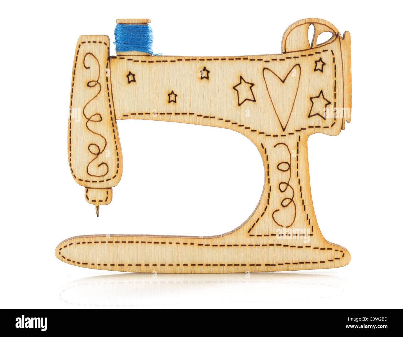 sewing machine toy isolated on white background Stock Photo - Alamy