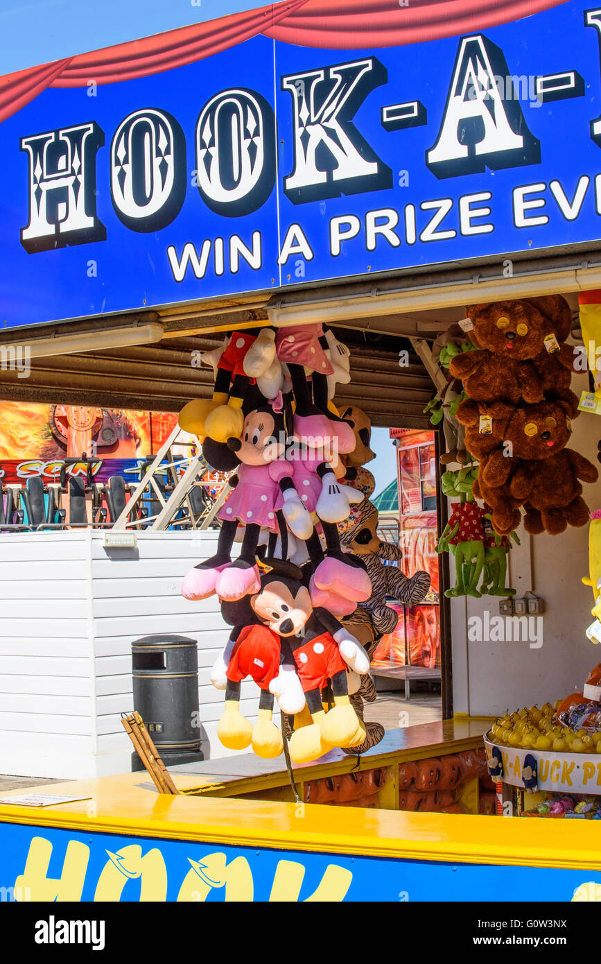 Soft toy prizes hanging on display at an amusement arcade on Central ...