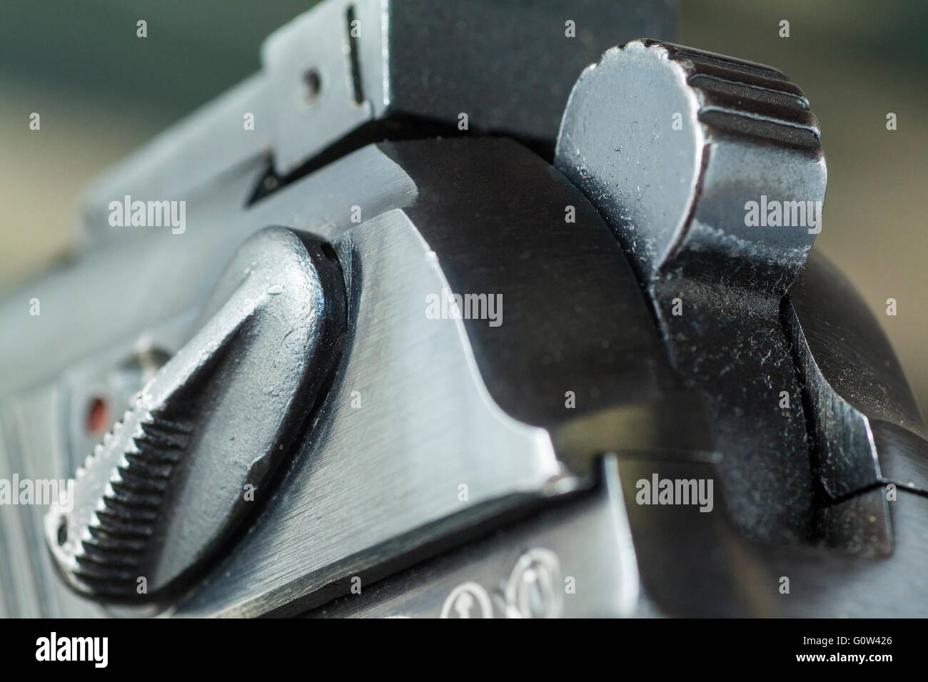 Firearm Pistol Clip And Hand Gun Ammunition on military camouflage ...