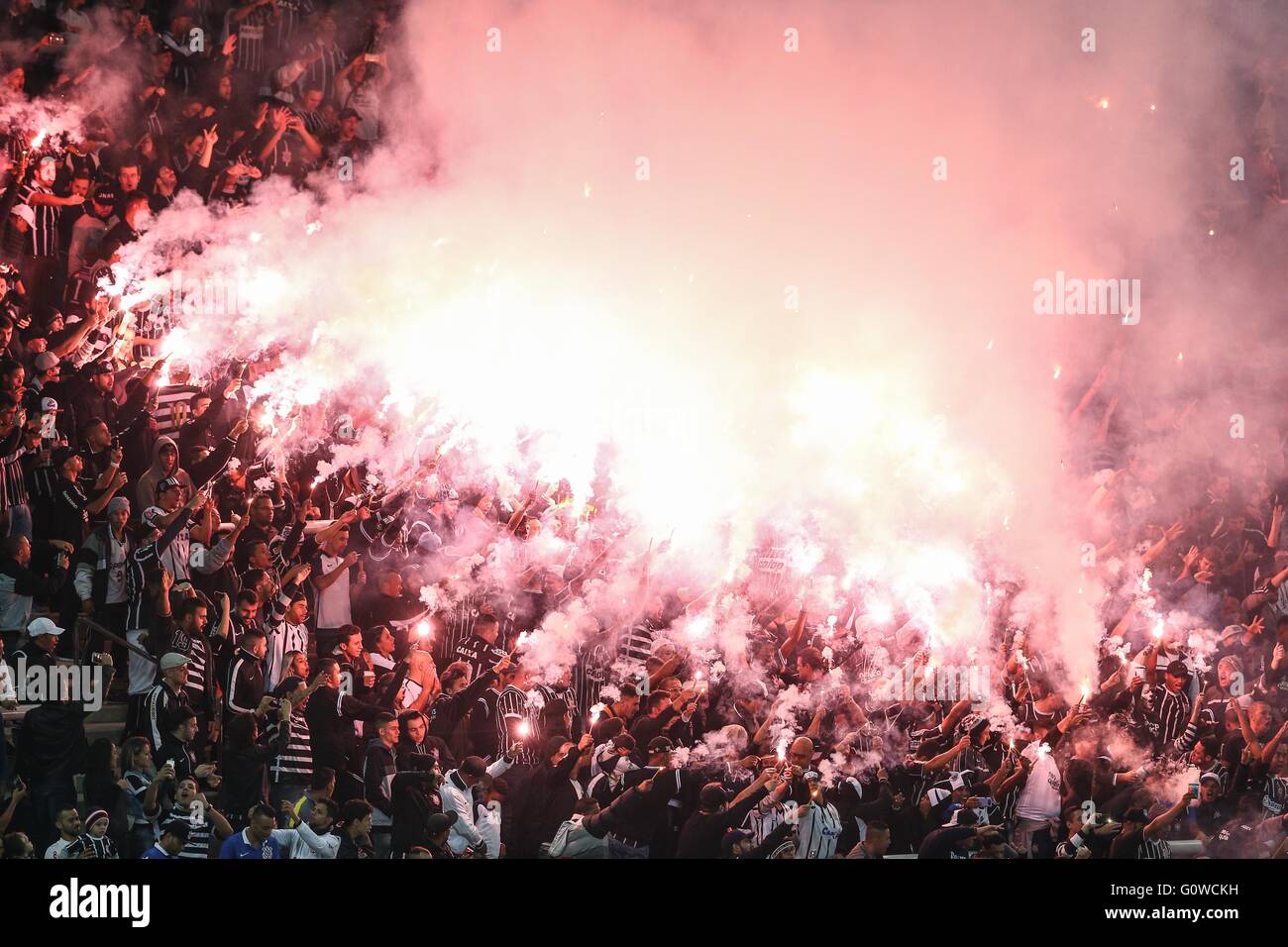Sao Paulo, Brazil. 4th May, 2016. Corinthians Fans light flares minutes ...
