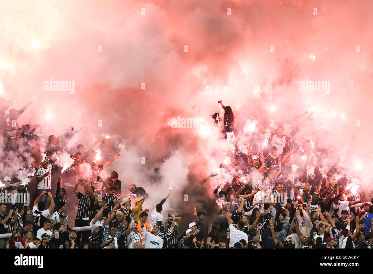 Sao Paulo, Brazil. 4th May, 2016. Corinthians Fans light flares minutes ...