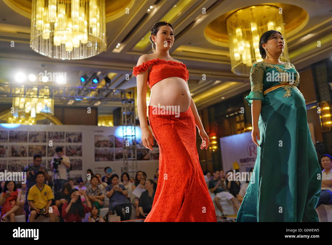Chongqing, China. 5th May, 2016. Pregnant women take part in a fashion ...