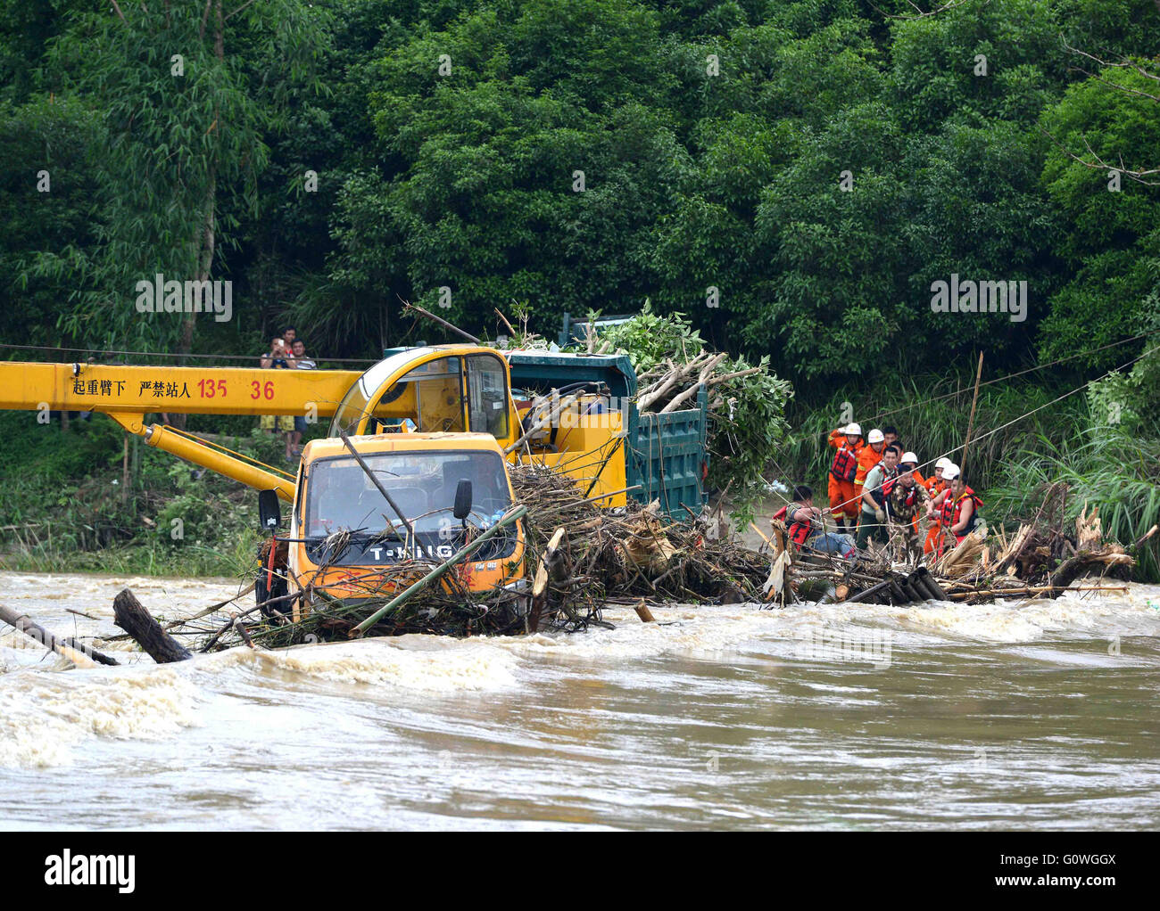 Guilin. 5th May, 2016. Firefighters rescue people in flood in Longsheng ...