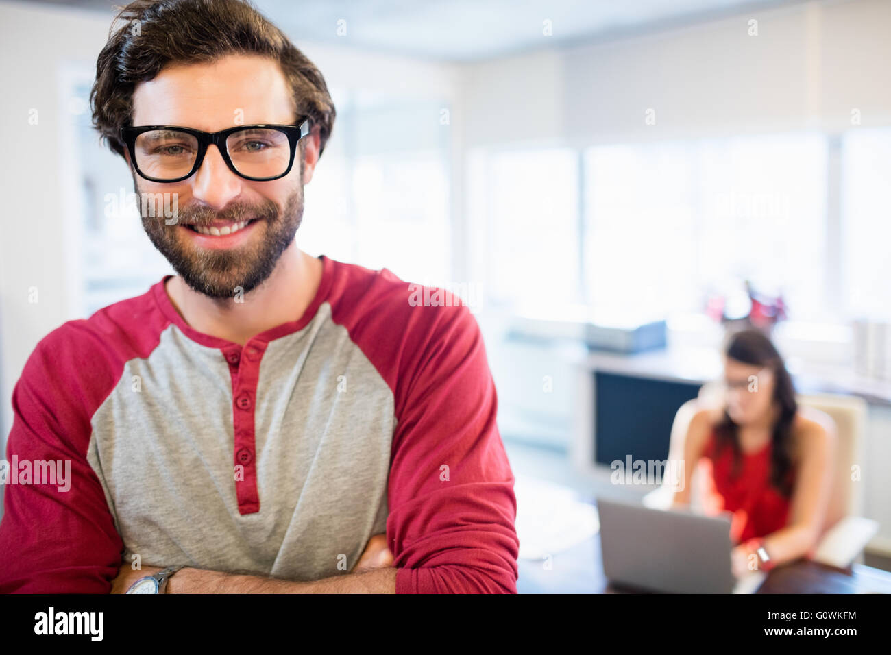 Businessman businesswoman crossed arms hi-res stock photography and images - Alamy