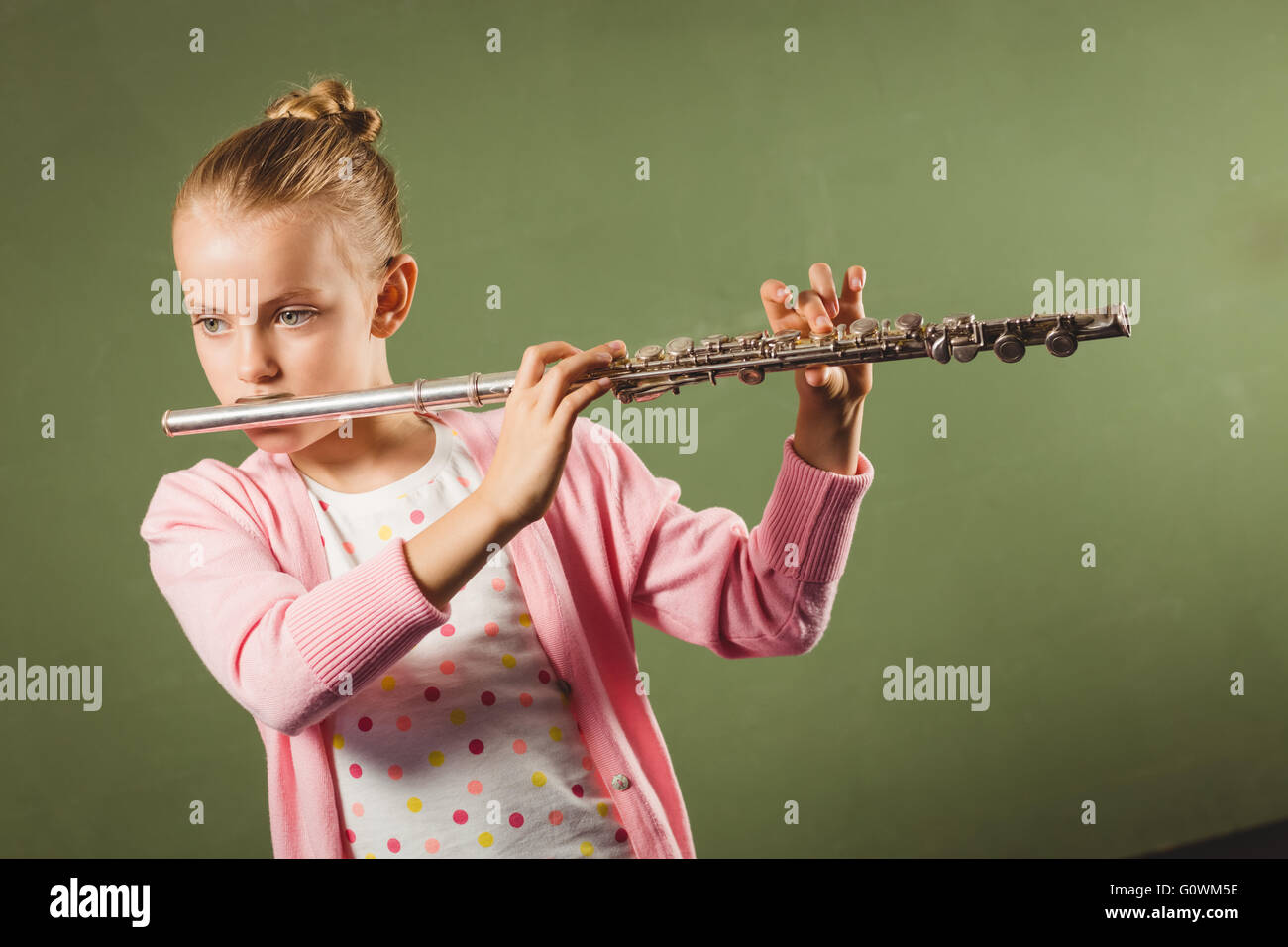 Girl playing the flute hi-res stock photography and images - Alamy