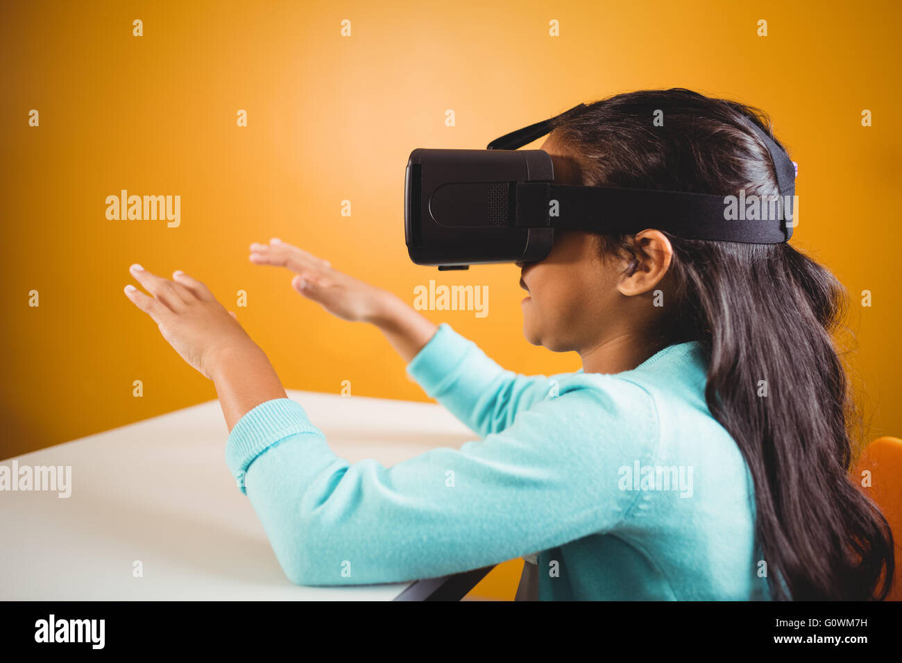 Girl using a virtual reality device Stock Photo - Alamy