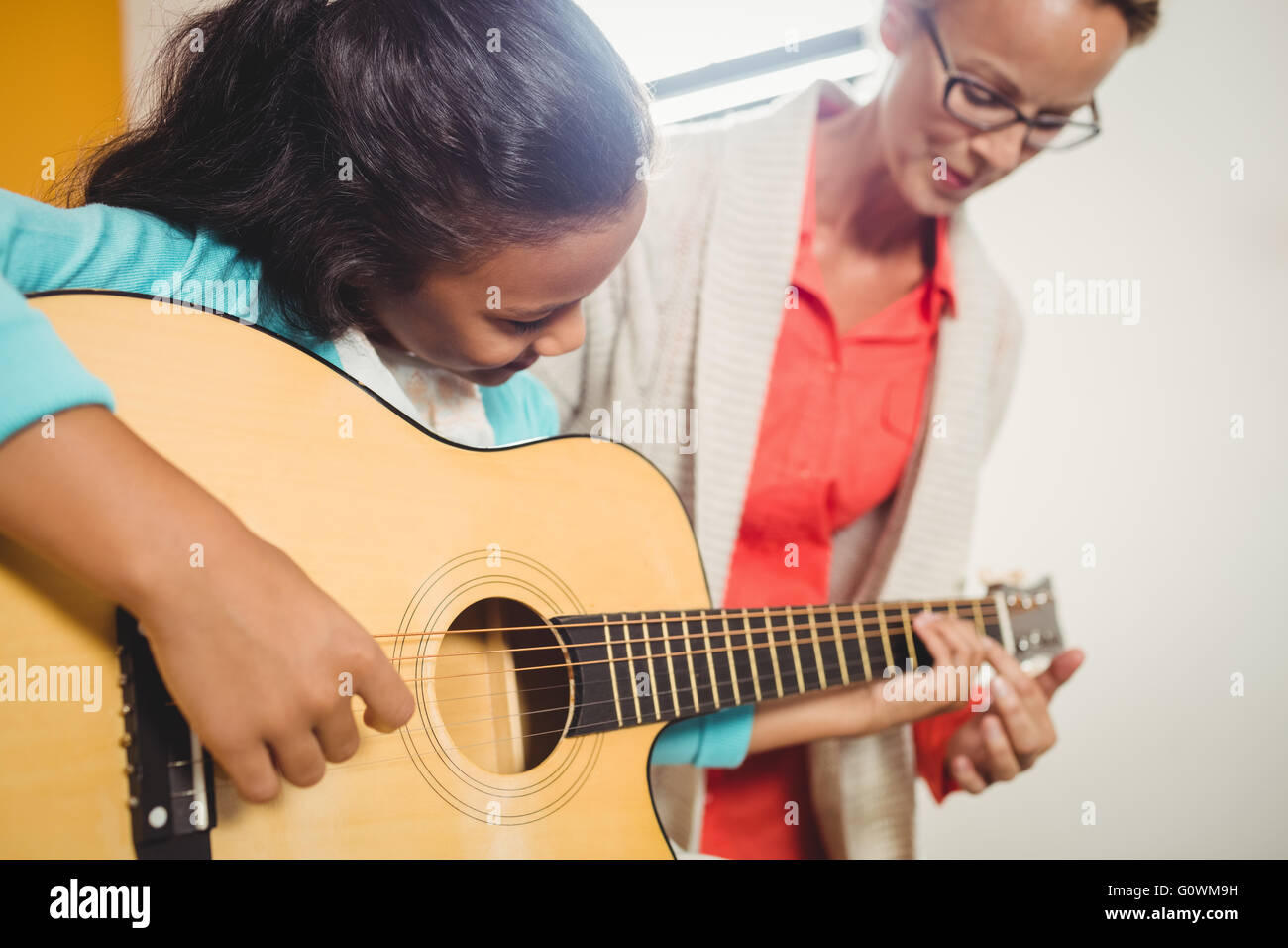 Music lesson girl learn play hi-res stock photography and images - Alamy