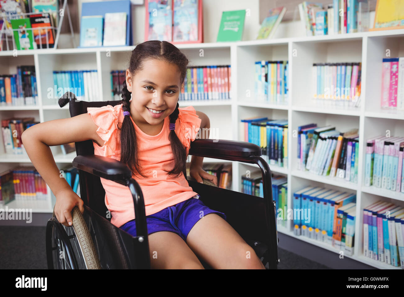 Girl learning wheelchair hi-res stock photography and images - Alamy