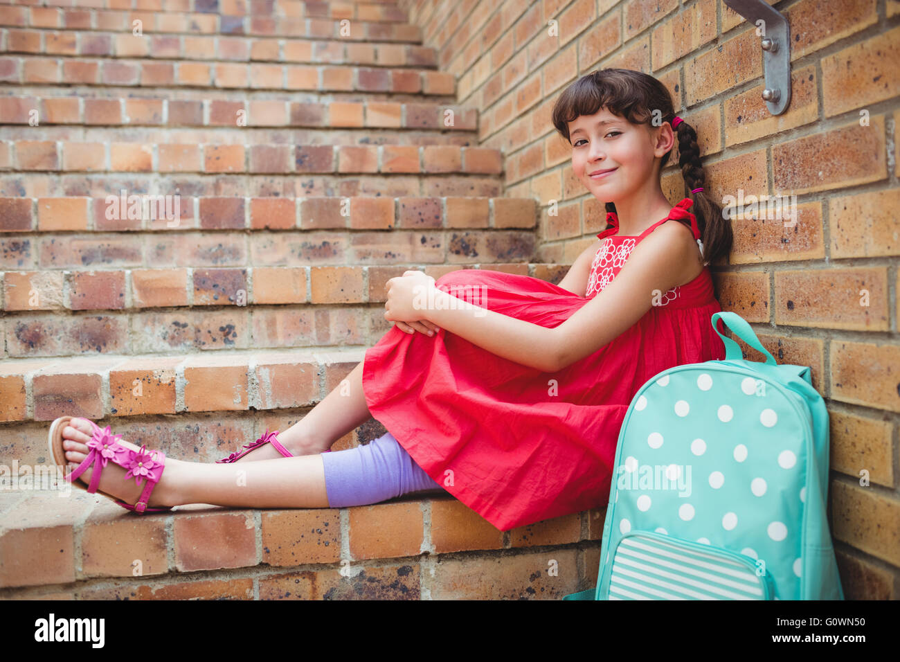 Schoolgirl sitting hi-res stock photography and images - Alamy