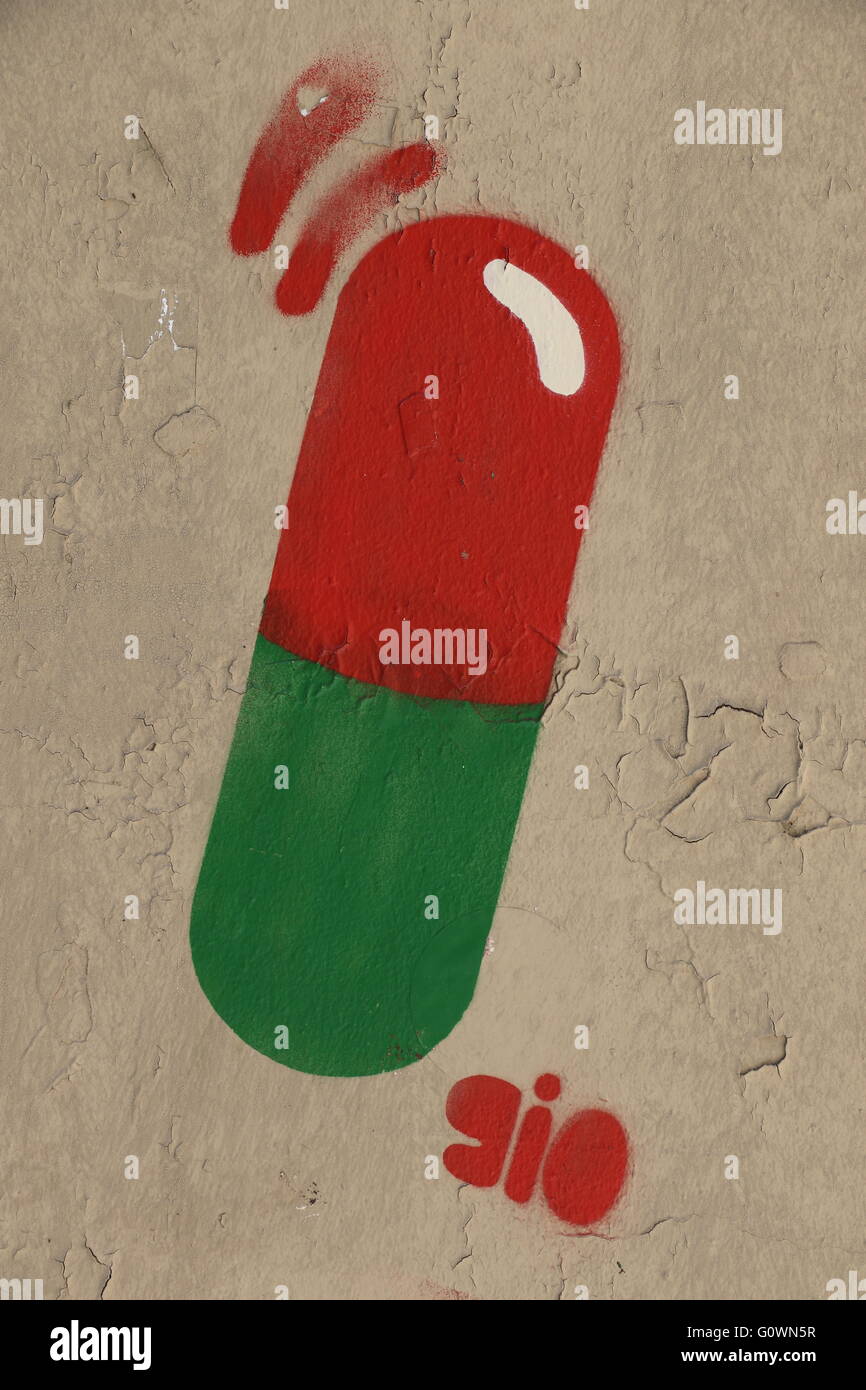 Street art in Paris representing a pill Stock Photo - Alamy