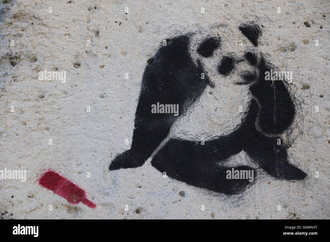 Street Art in Paris representing a drunk panda Stock Photo - Alamy