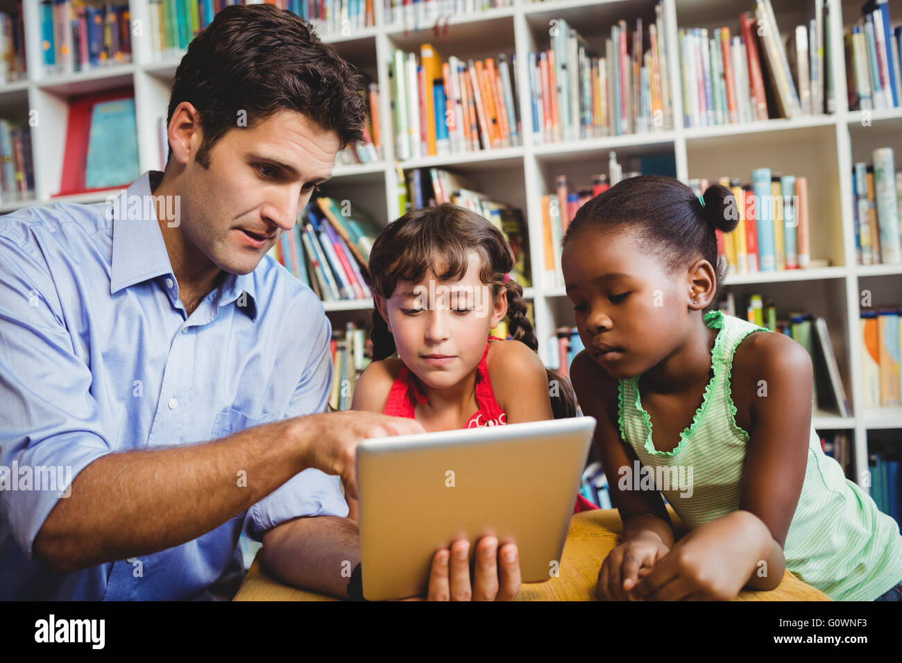 Man pointing a digital tablet Stock Photo - Alamy