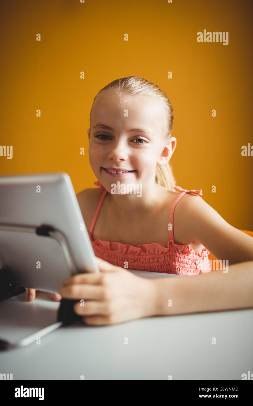 Cute girl using digital tablet Stock Photo - Alamy