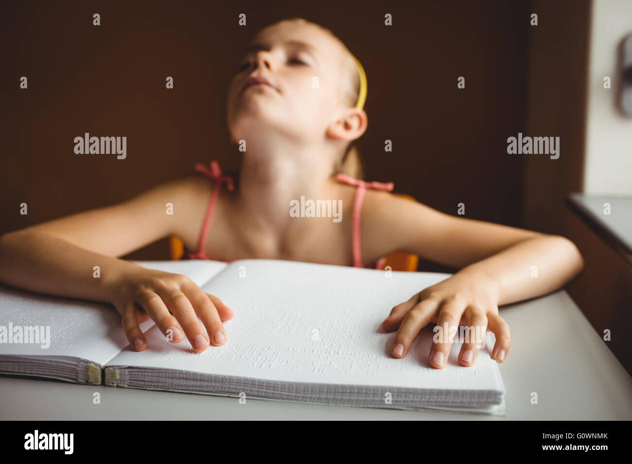 Blind girl reading braille hi-res stock photography and images - Alamy