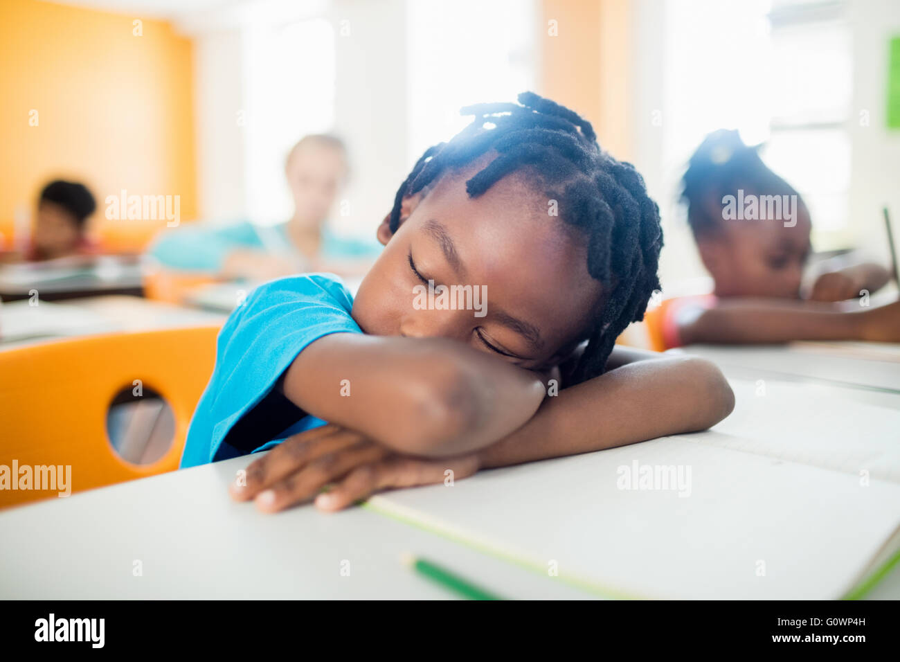 Boy falling desk hi-res stock photography and images - Alamy