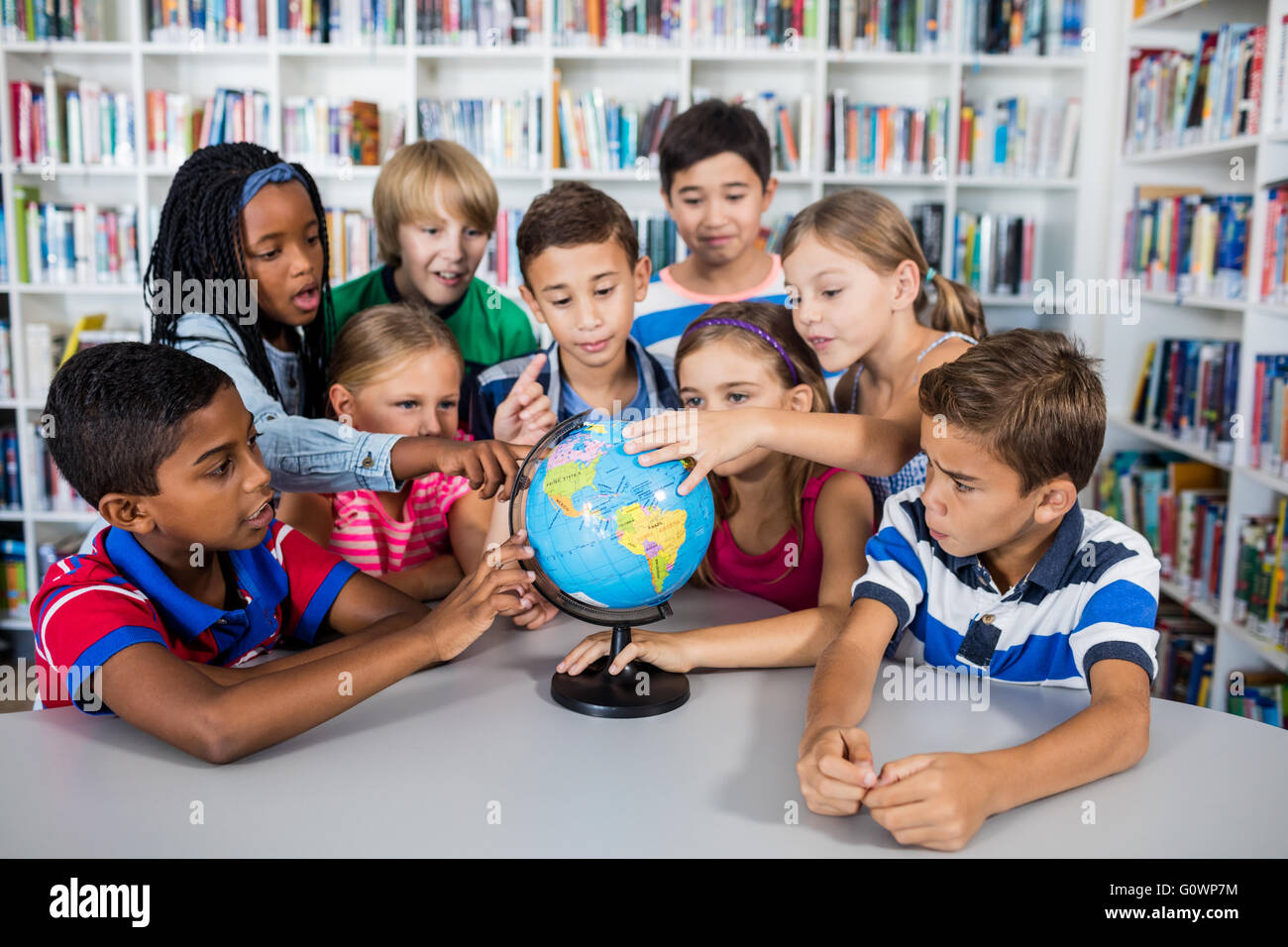 Children tablet globe hi-res stock photography and images - Alamy