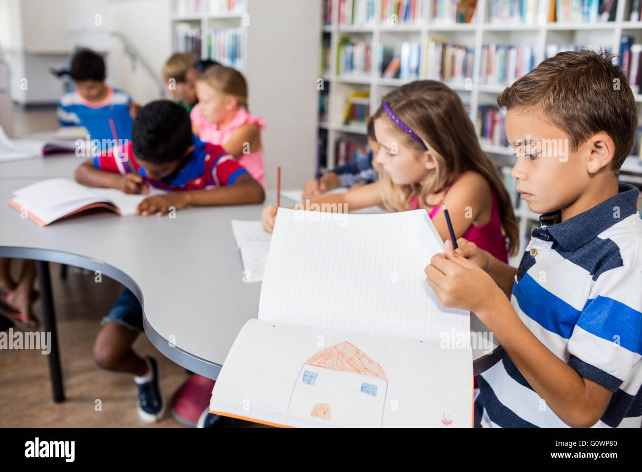 Side view of pupils drawing Stock Photo - Alamy