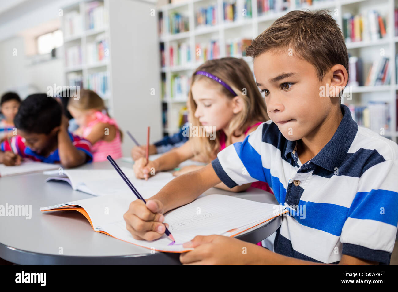 Side view of pupils drawing Stock Photo - Alamy