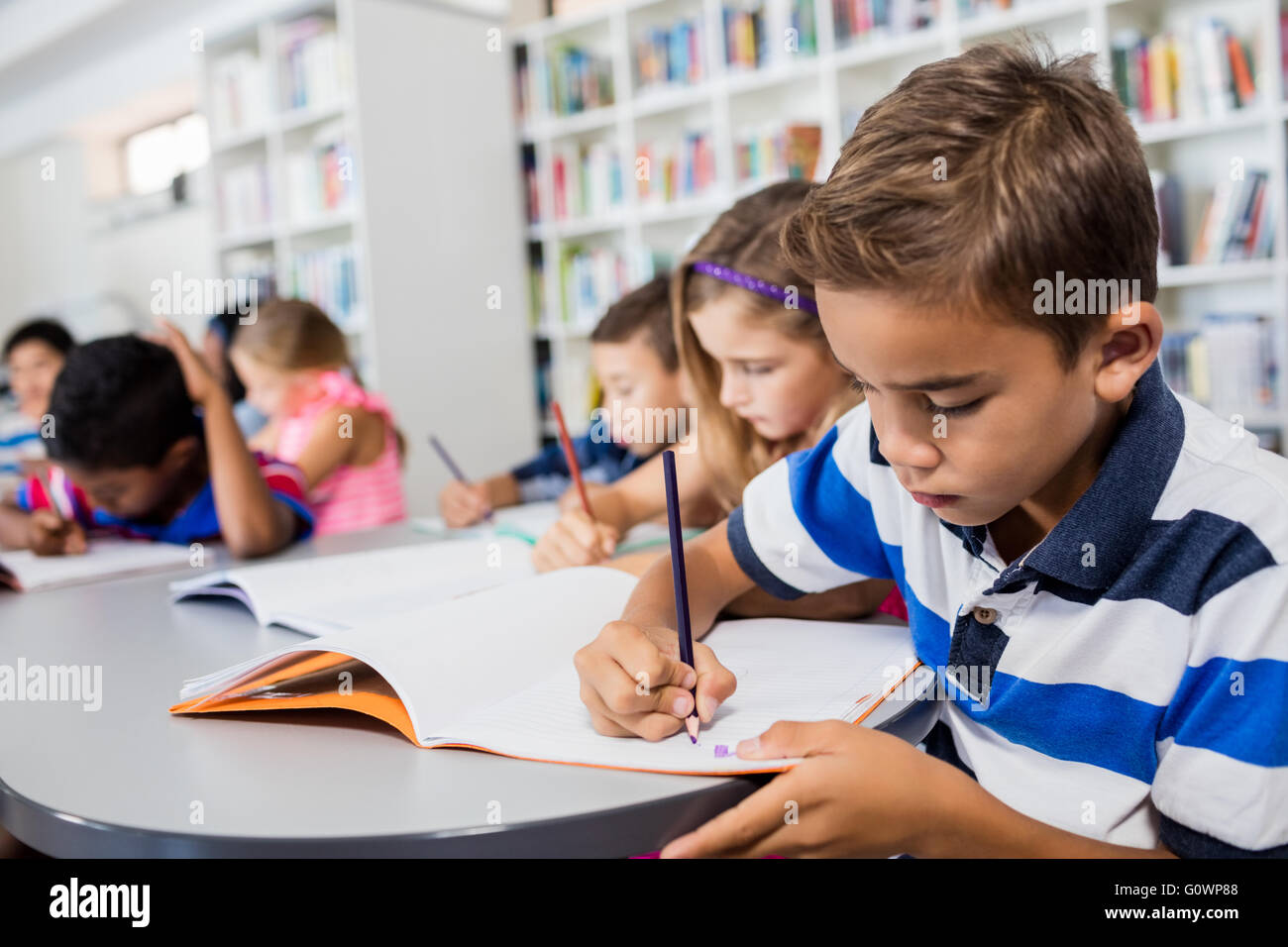 Side view of pupils drawing Stock Photo - Alamy