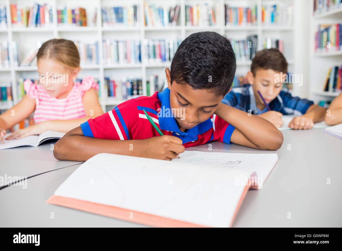 Front view of children coloring Stock Photo - Alamy