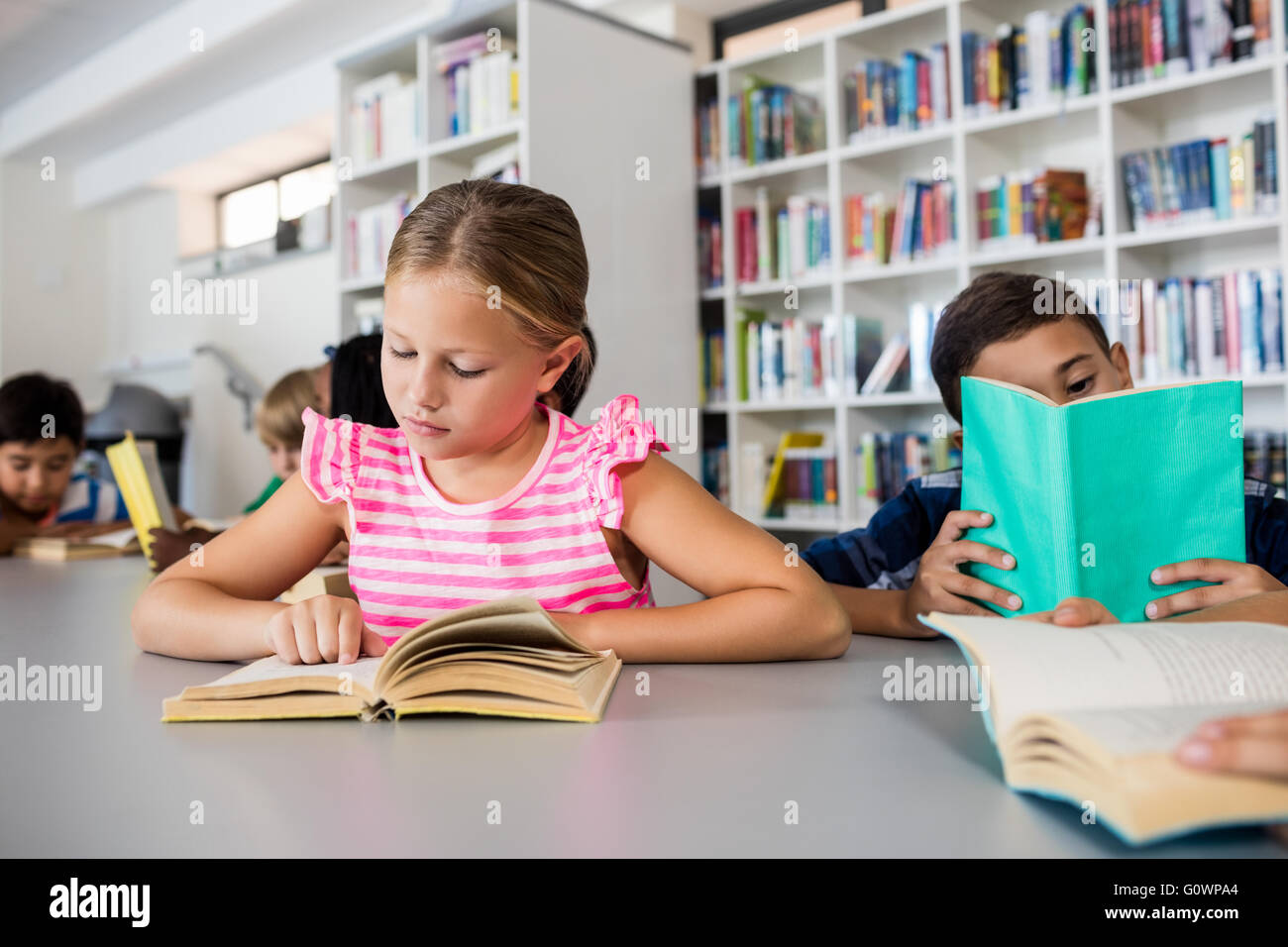 Children reading library hi-res stock photography and images - Alamy