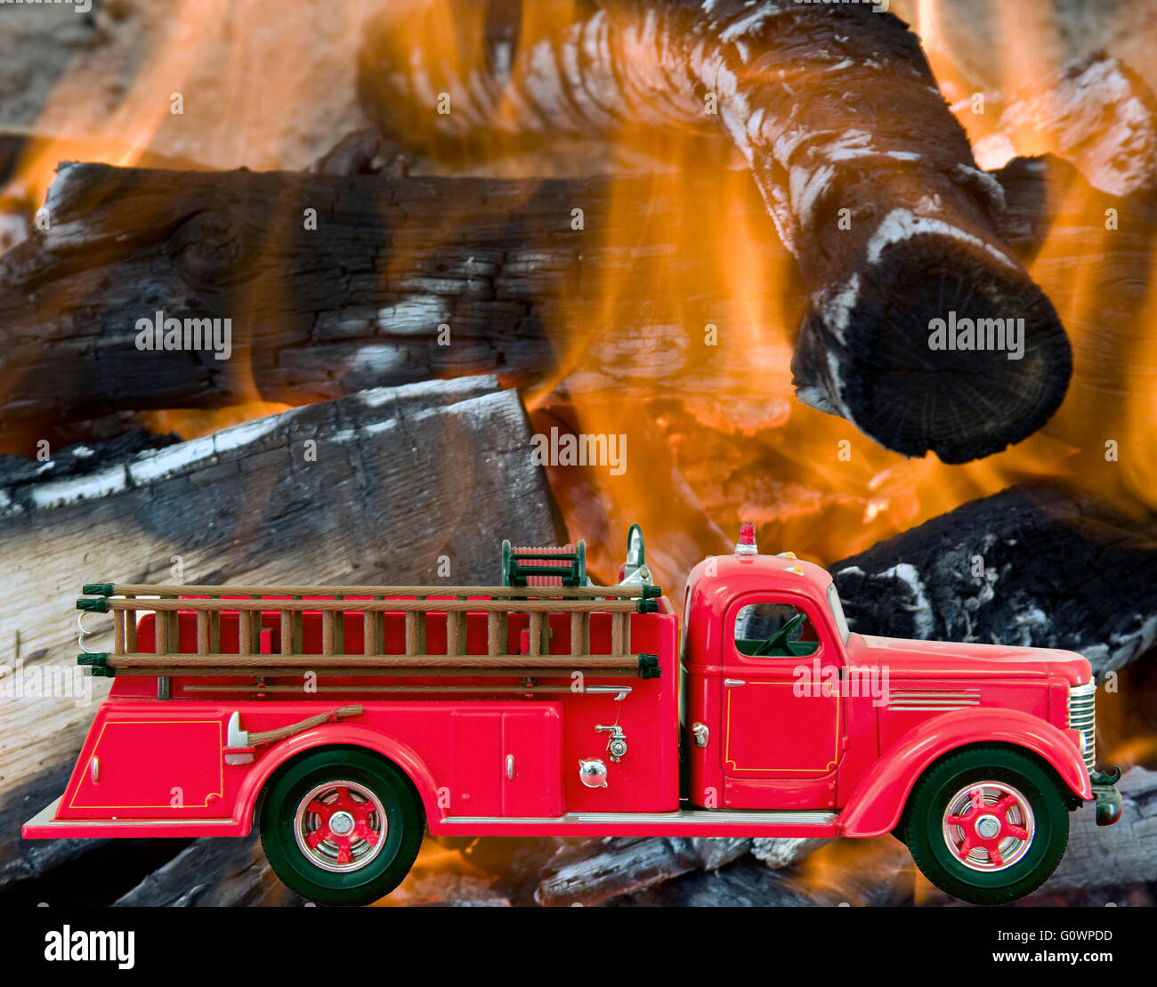 Red Firetruck over a fire and flames background Stock Photo - Alamy