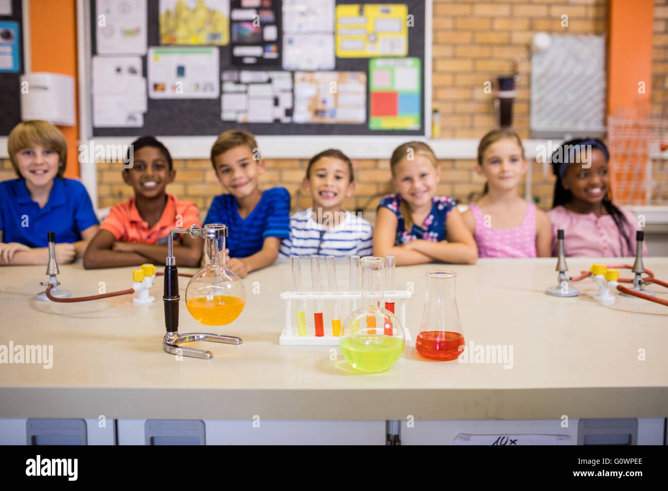 Students posing with chemical objects Stock Photo - Alamy