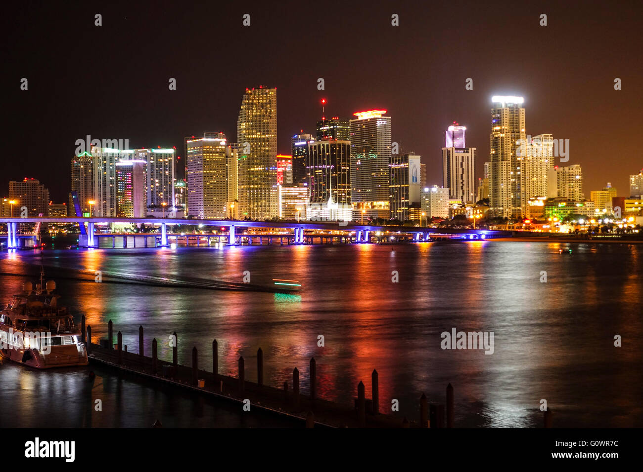 Colorful Miami skyline by night Stock Photo - Alamy