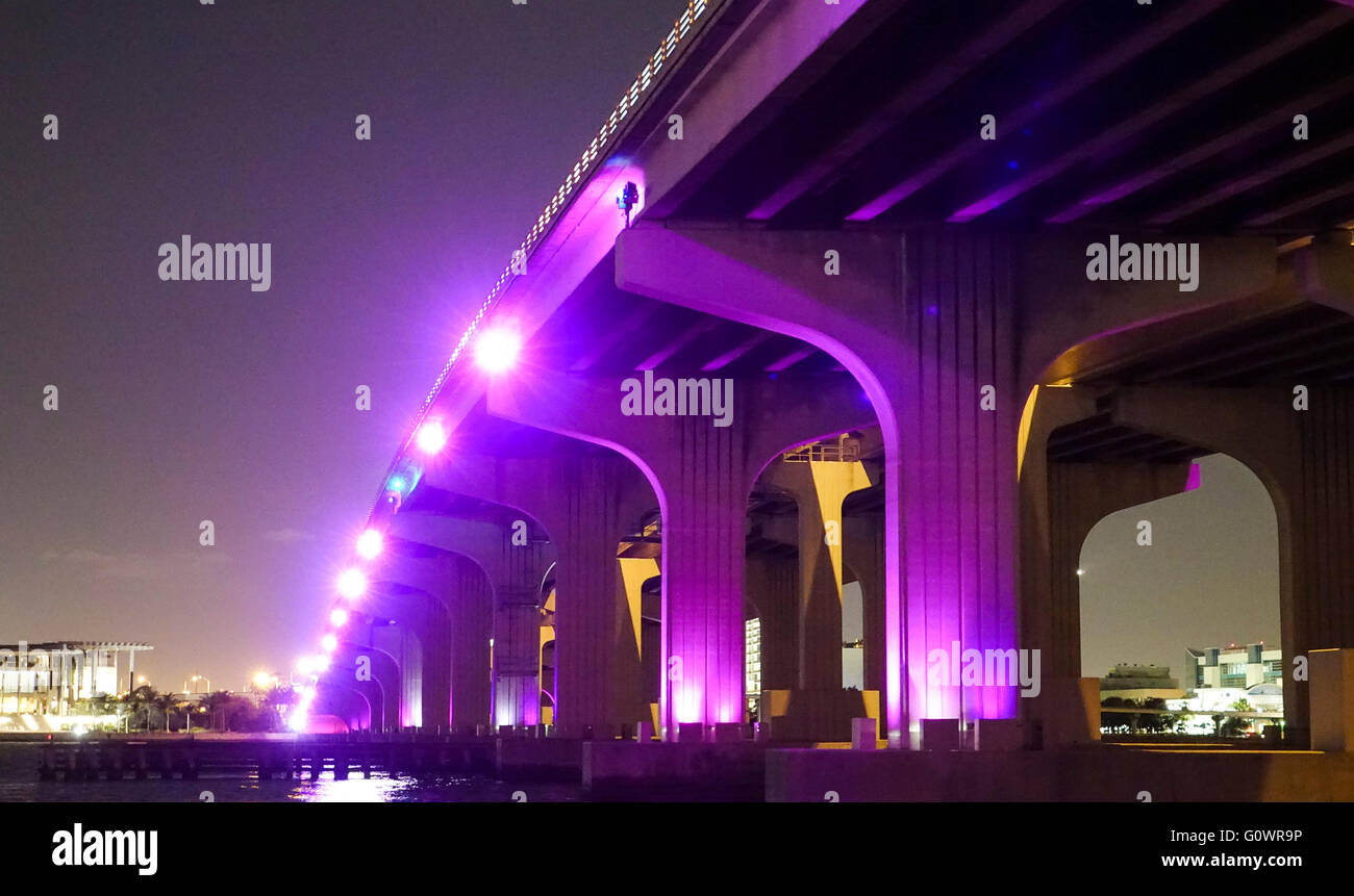 Colorful illuminated Bridge to Miami Beach by night Stock Photo - Alamy