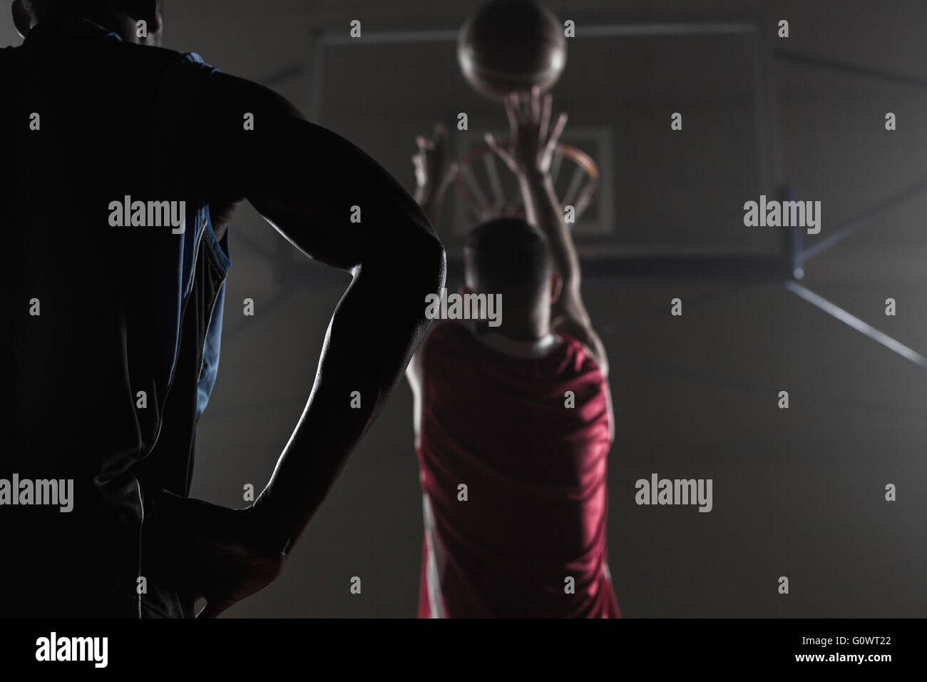 Rear view basketball player shooting hi-res stock photography and ...