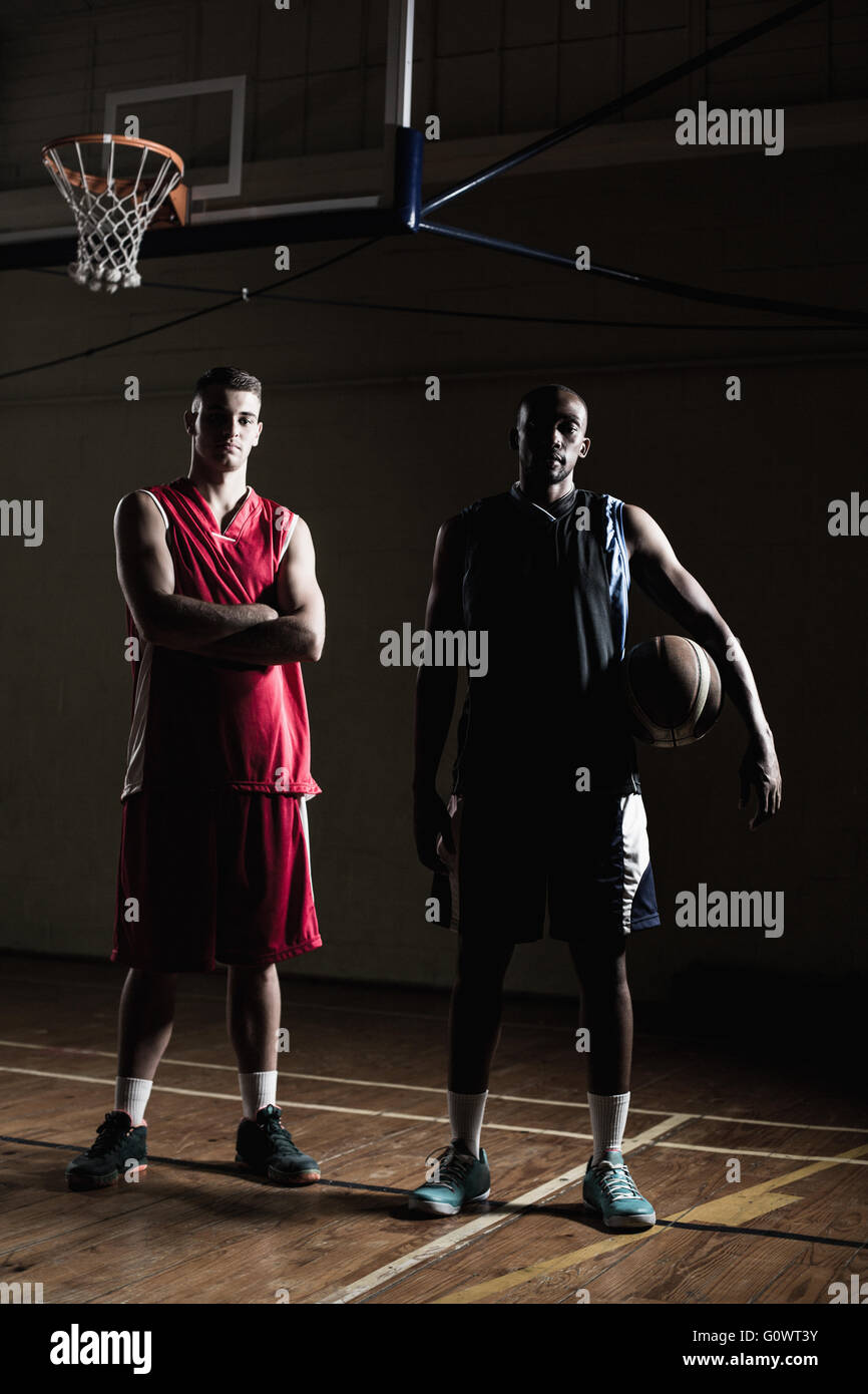 Basketball player looking the camera and posing Stock Photo - Alamy