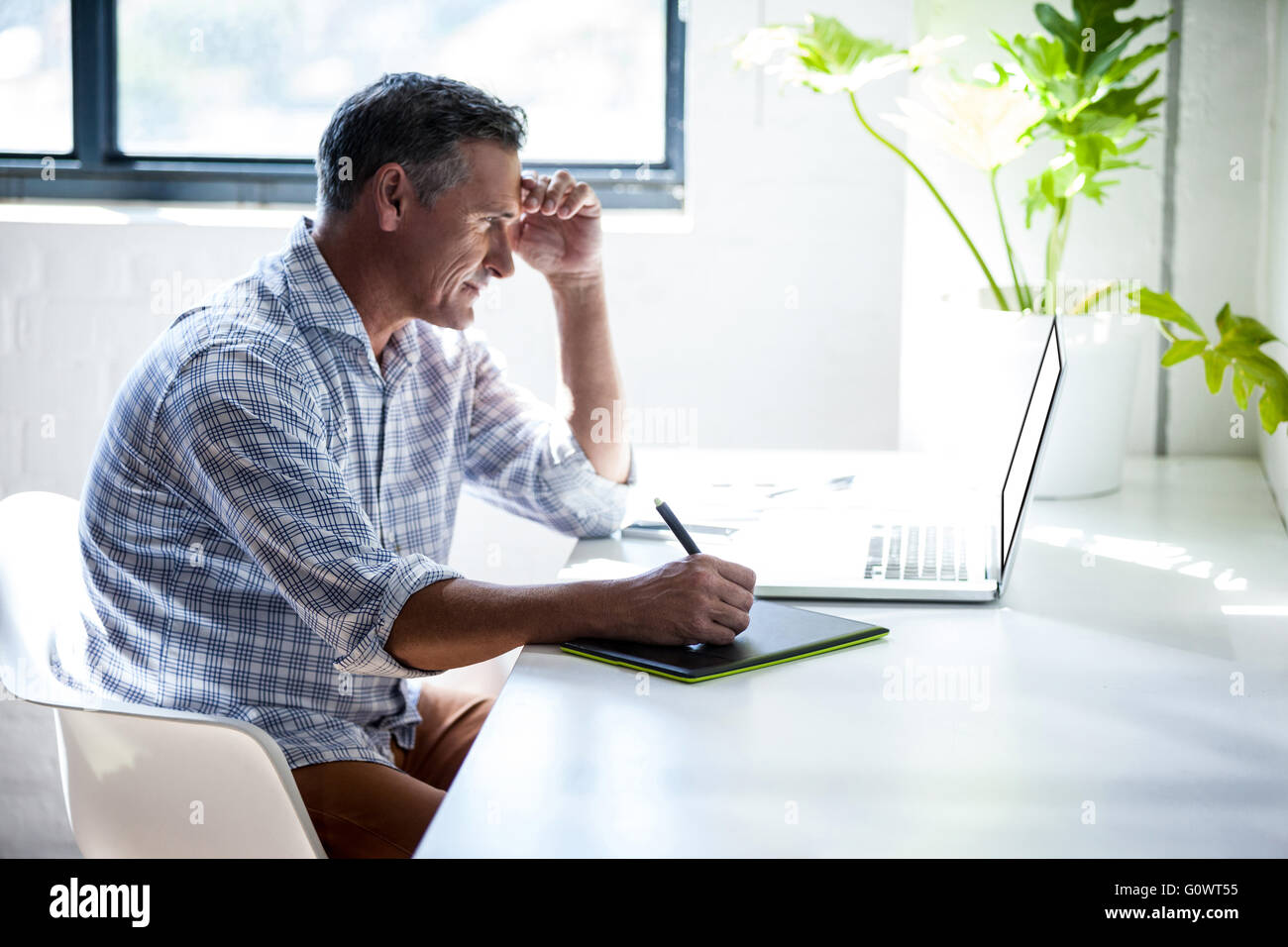 Man Working At Desk