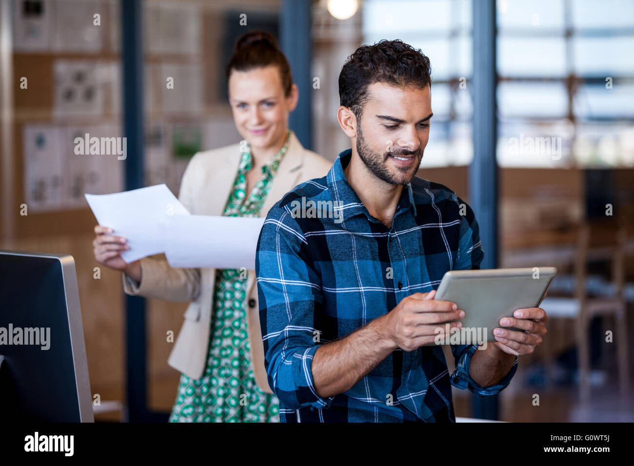 Serious young people working hi-res stock photography and images - Alamy