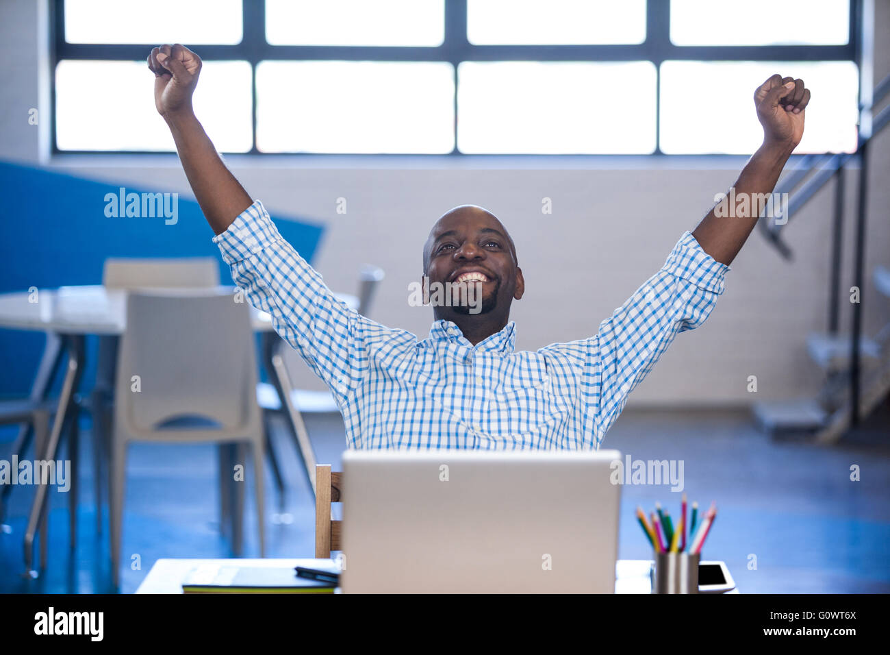 Businessman arms up hi-res stock photography and images - Alamy