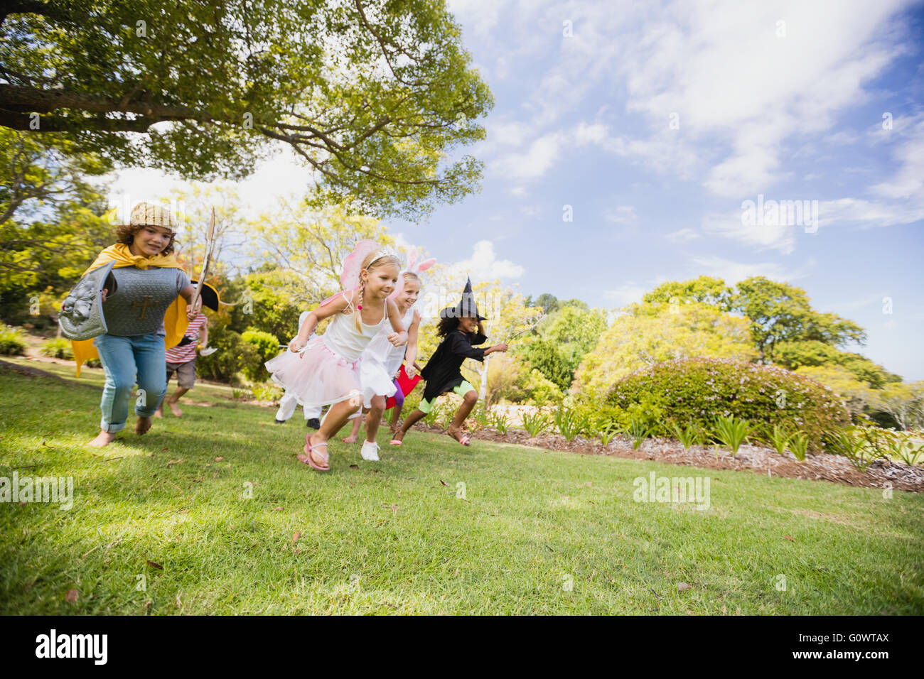 Happy children racing Stock Photo - Alamy