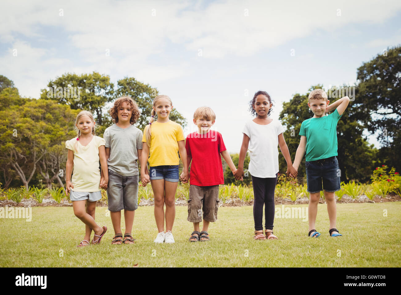 Children holding hands Stock Photo - Alamy