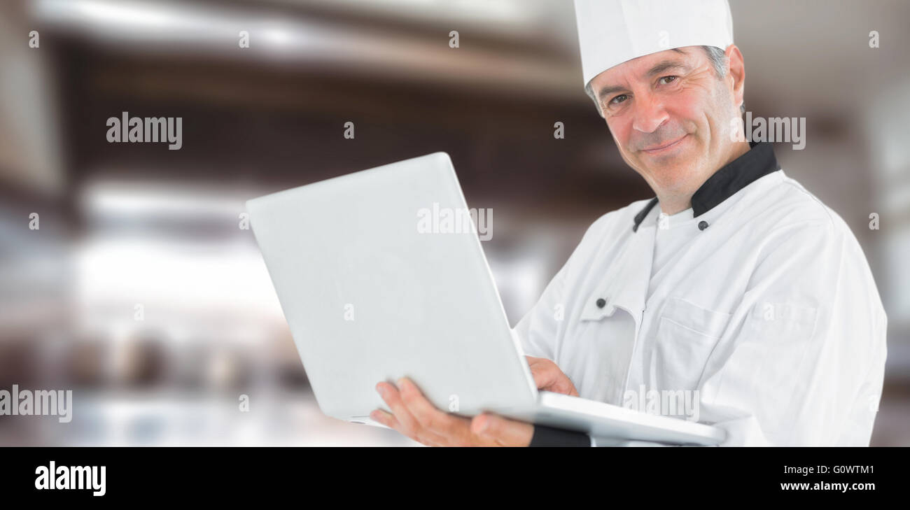Chef with a laptop computer hi-res stock photography and images - Alamy