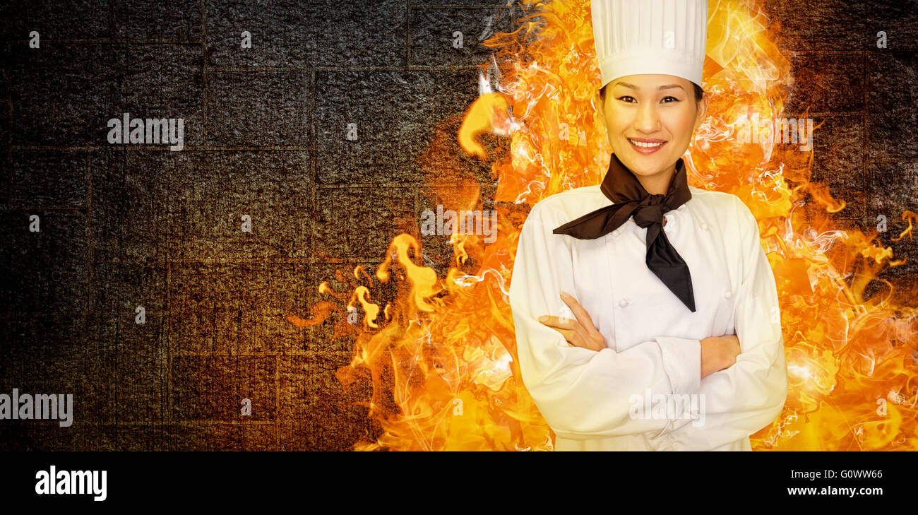 Composite image of portrait of smiling female cook in kitchen Stock ...