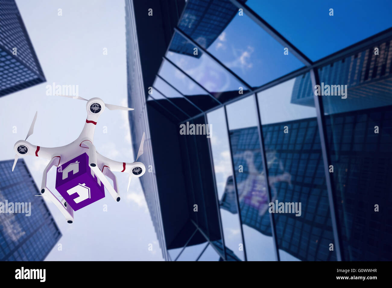 Composite image of a drone bringing a purple cube Stock Photo - Alamy