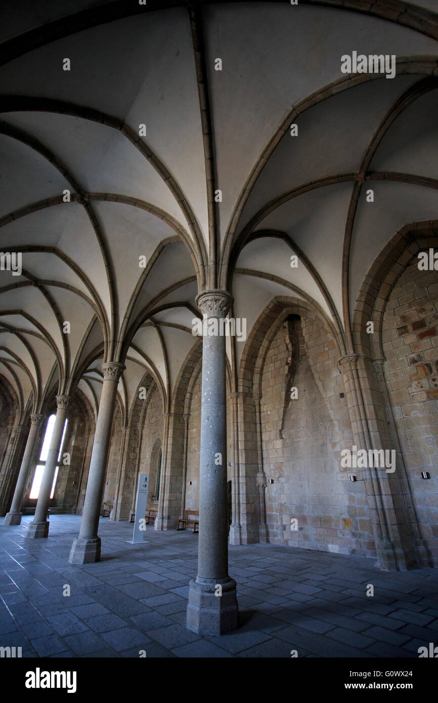 Intricately carved rooves and columns inside the Mont San Michel ...