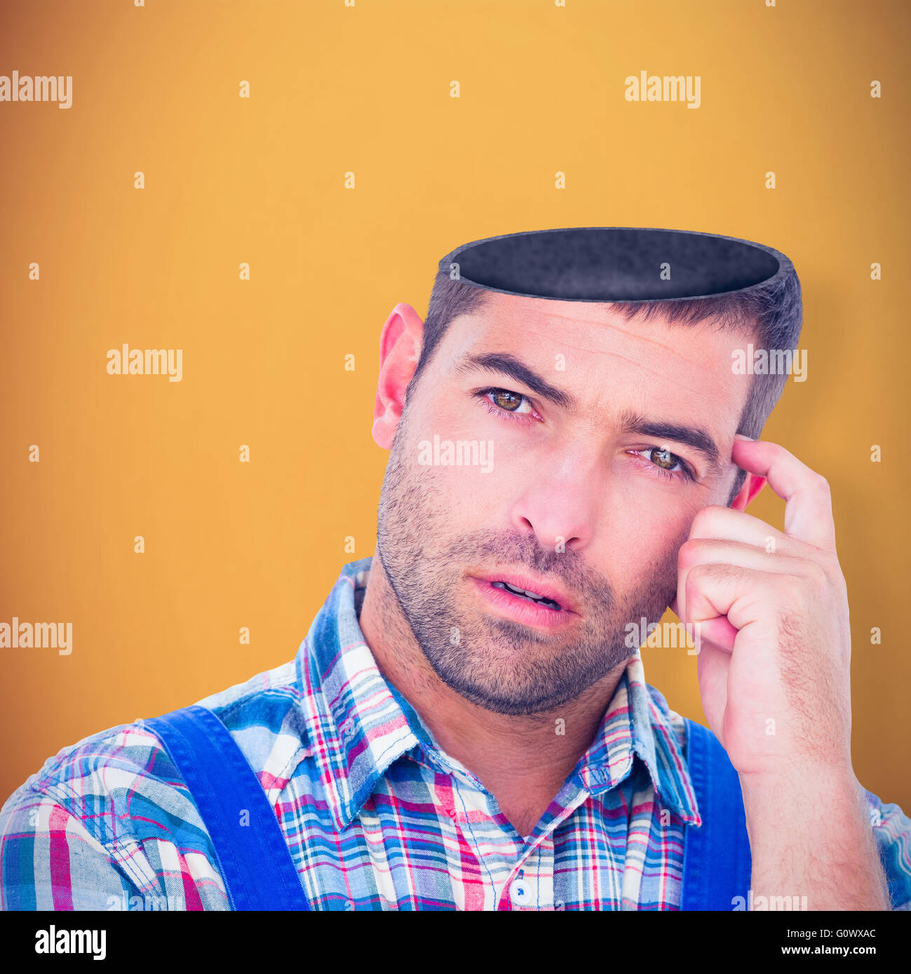 Confused male technician scratching head hi-res stock photography and ...